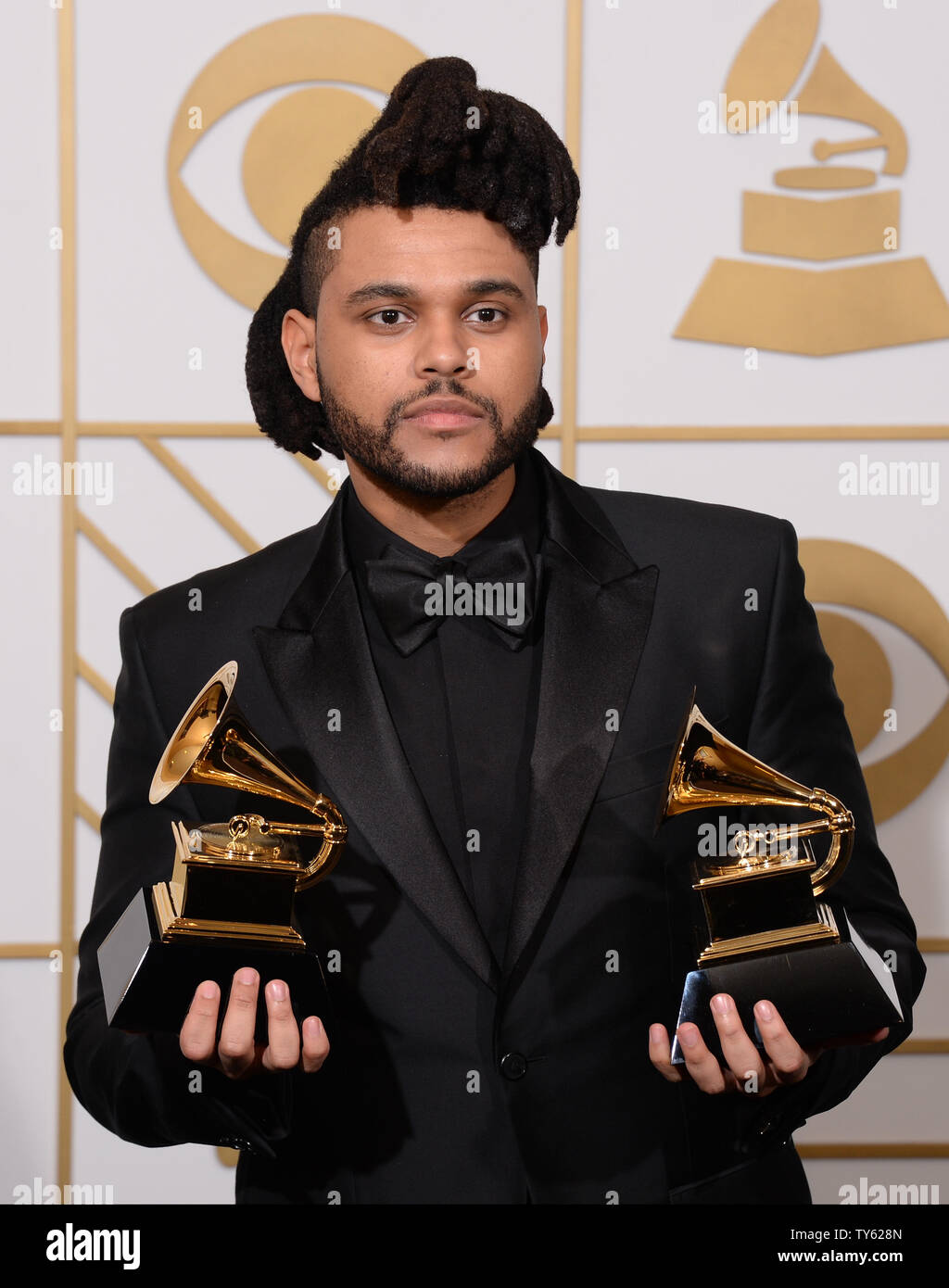 The Weeknd, winner of the Best R&B Performance award for 'Earned It ...