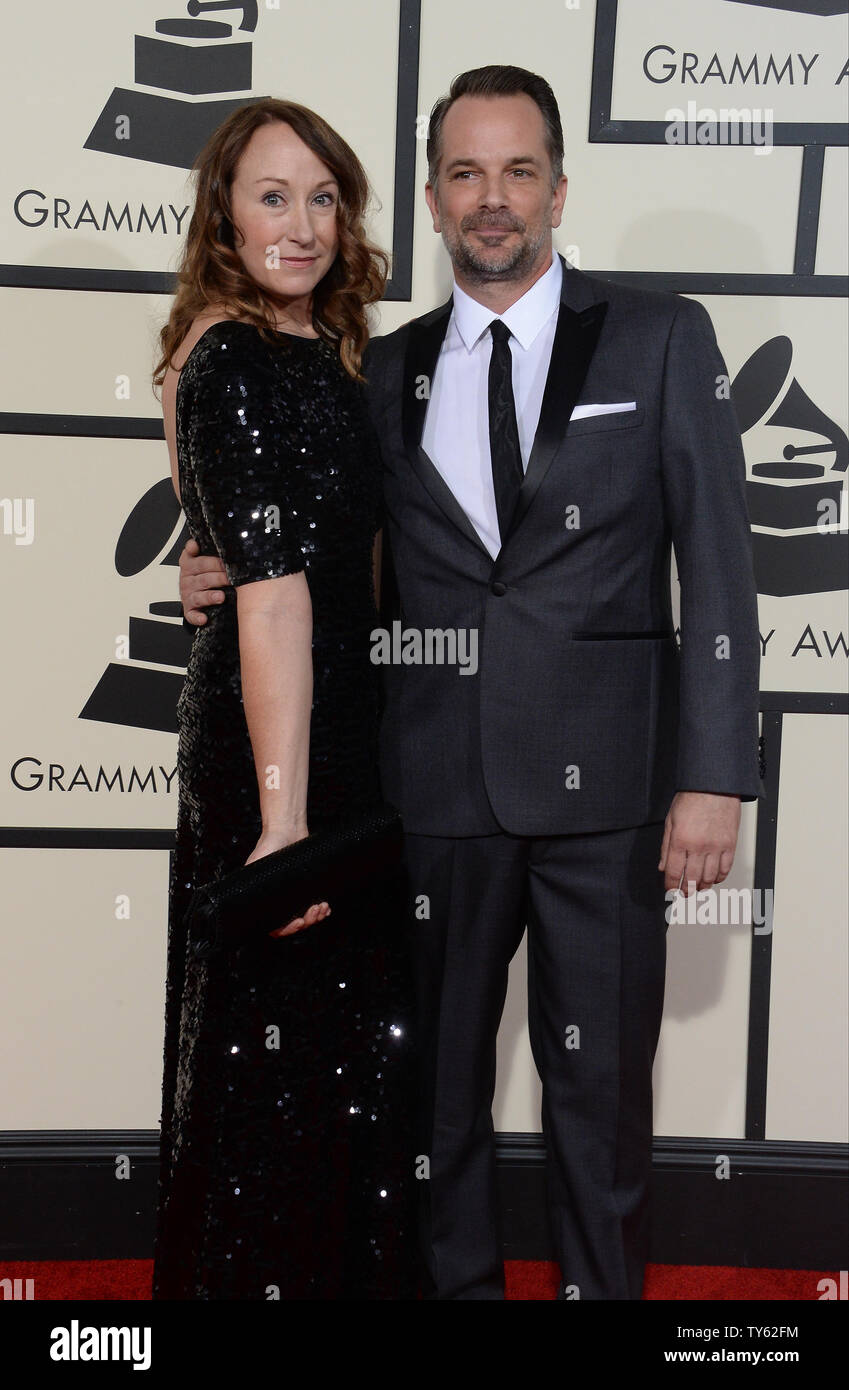 Sasha Bozzi, left, and Mike Bozzi arrive for the 58th annual Grammy ...