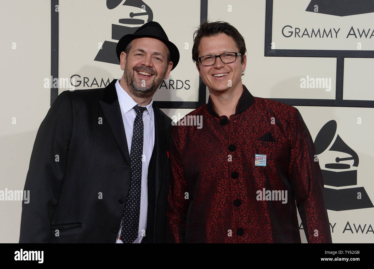 From left, Madi Das and Dave Stringer arrive for the 58th annual Grammy ...