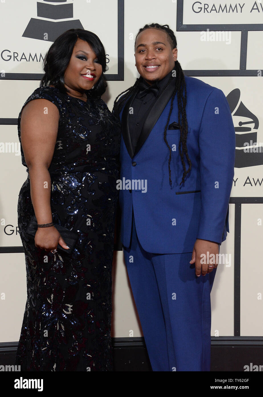 Jamison Ross, right, and guest arrive for the 58th annual Grammy Awards ...