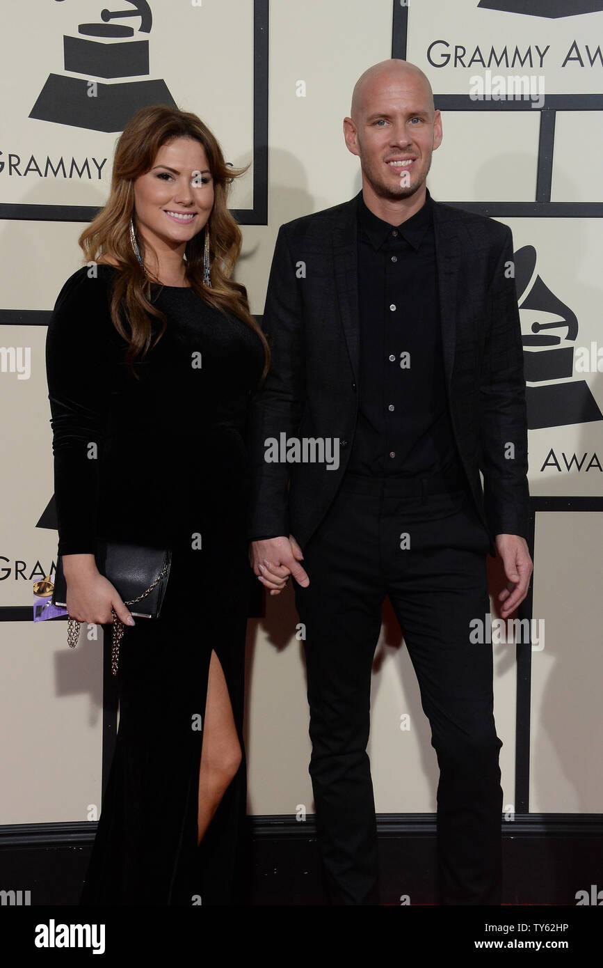 Phil Hanseroth, right, and guest arrive for the 58th annual Grammy ...