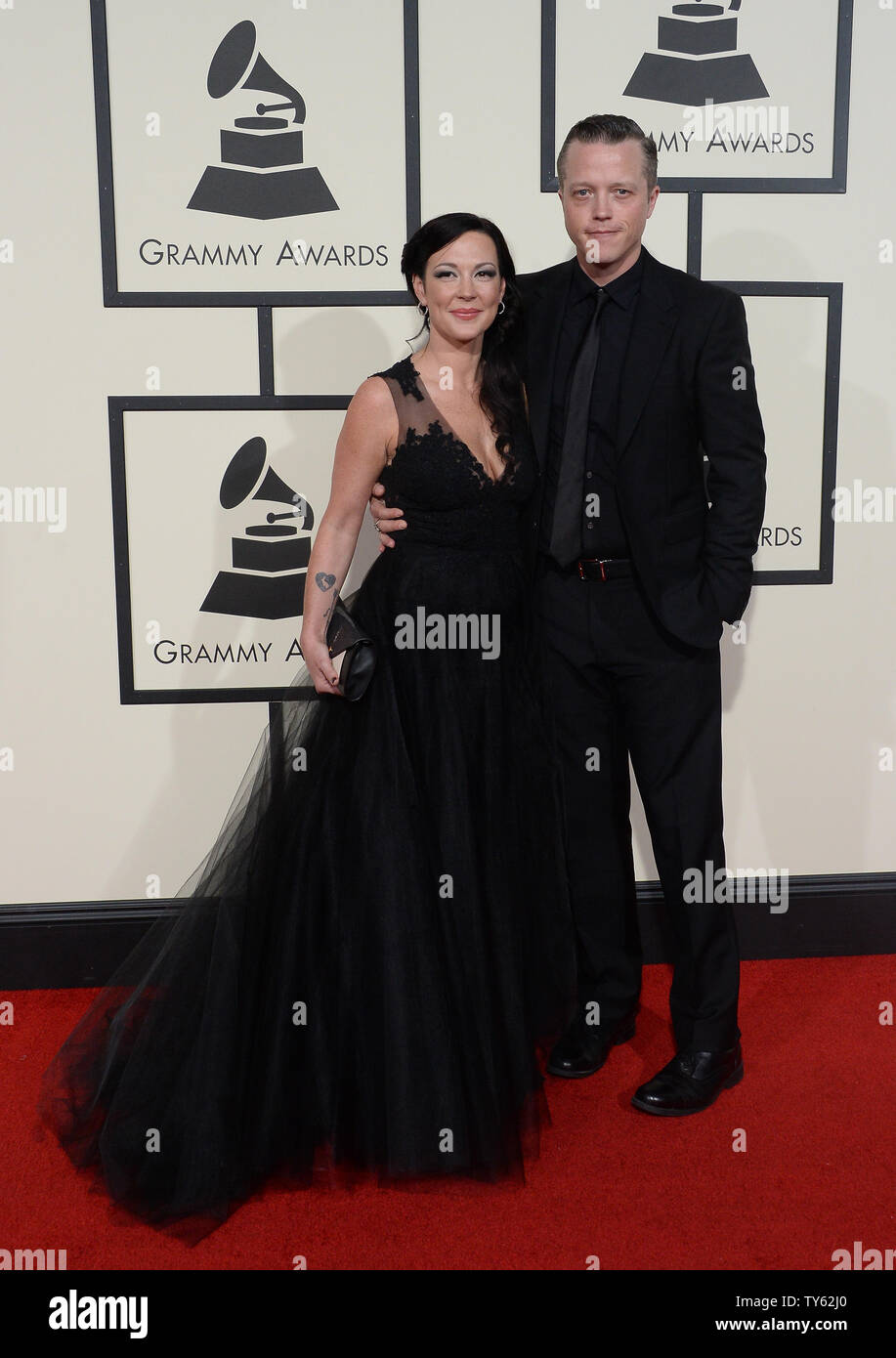 Amanda Shires, left, and Jason Isbell arrive for the 58th annual Grammy ...