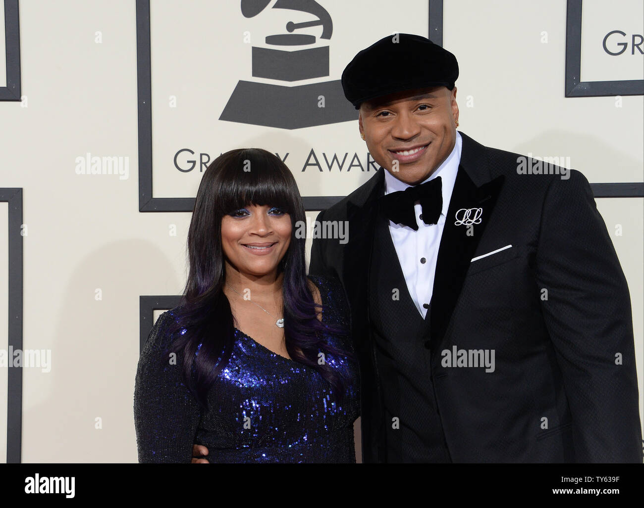 Simone Smith, left, and LL Cool J arrive for the 58th annual Grammy ...