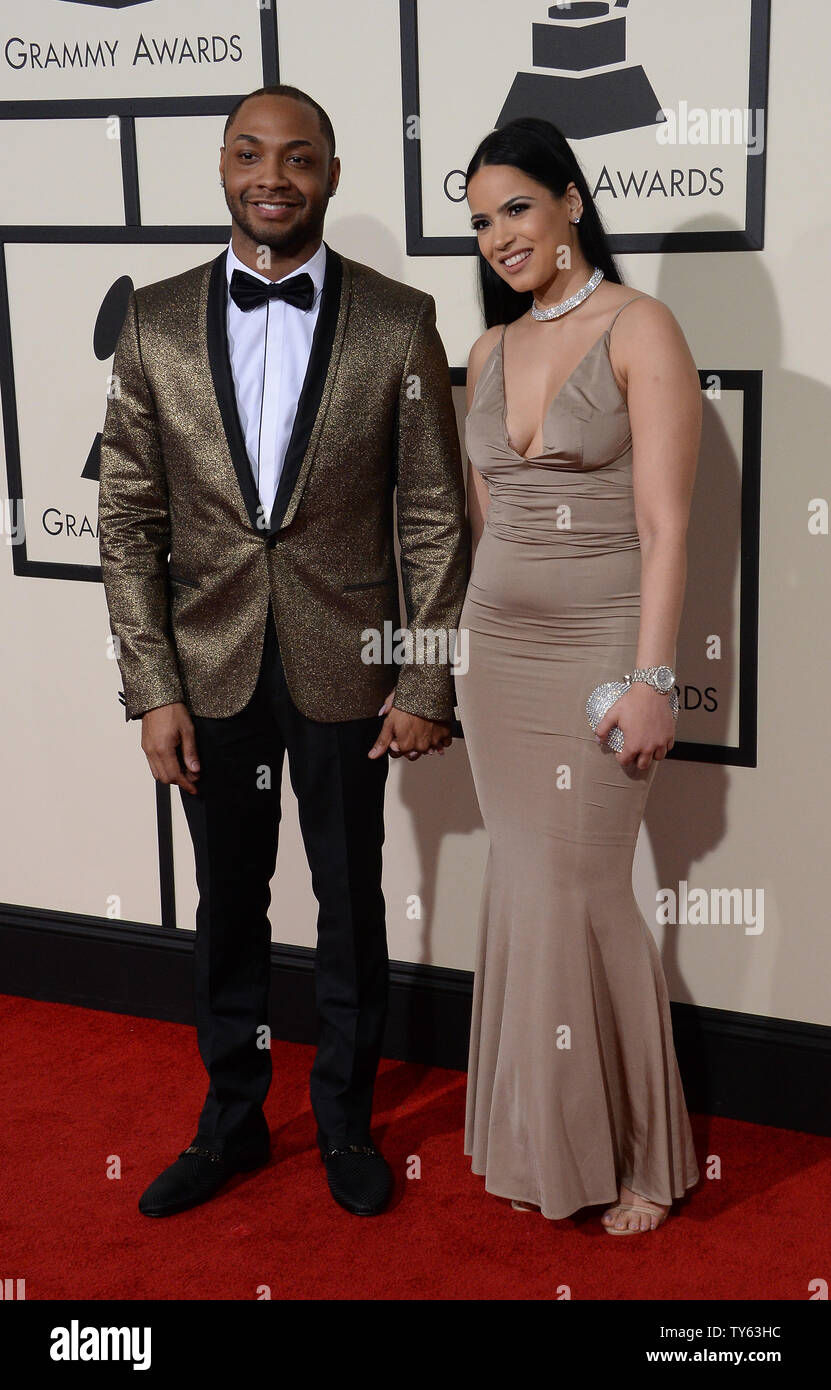 Allen Ritter, left, and guest arrive for the 58th annual Grammy Awards ...