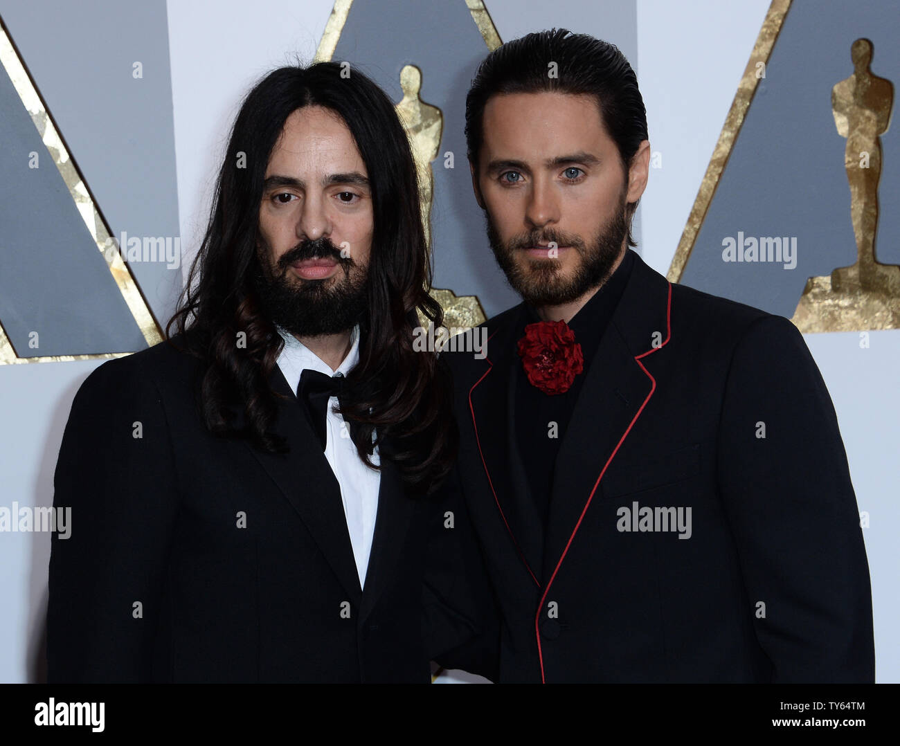 Designer Alessandro Michele (L) and actor Jared Leto arrive on the red ...