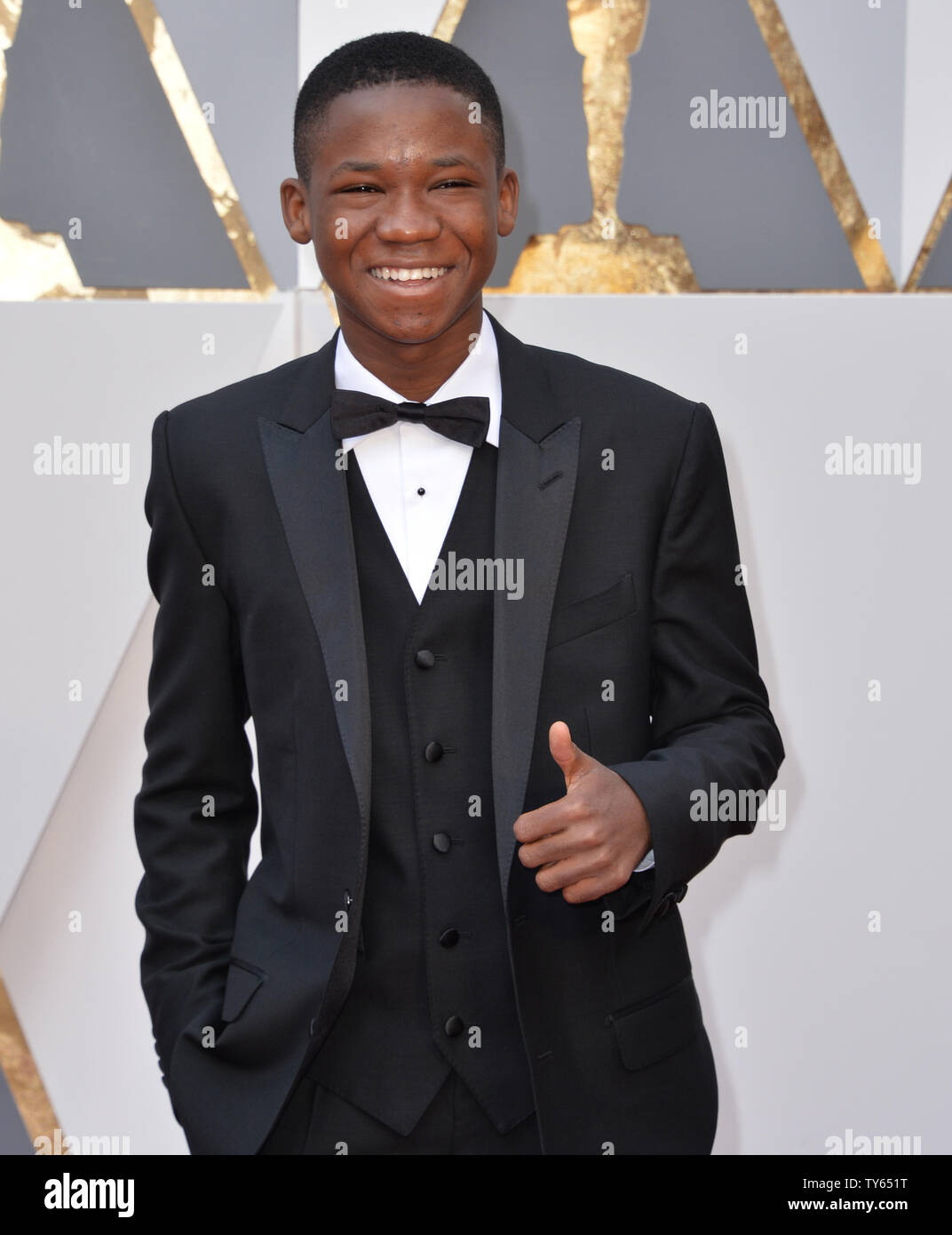 Abraham Attah arrives on the red carpet for the 88th Academy Awards at ...