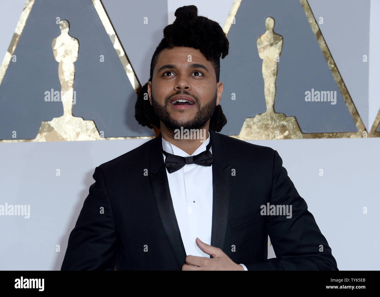 Singer The Weeknd arrives on the red carpet for the 88th Academy Awards ...