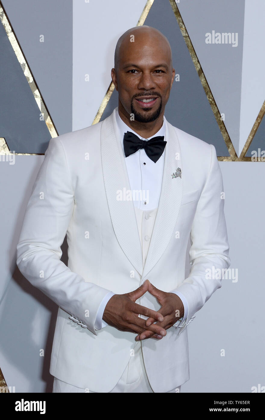 Singer Common arrives on the red carpet for the 88th Academy Awards, at ...