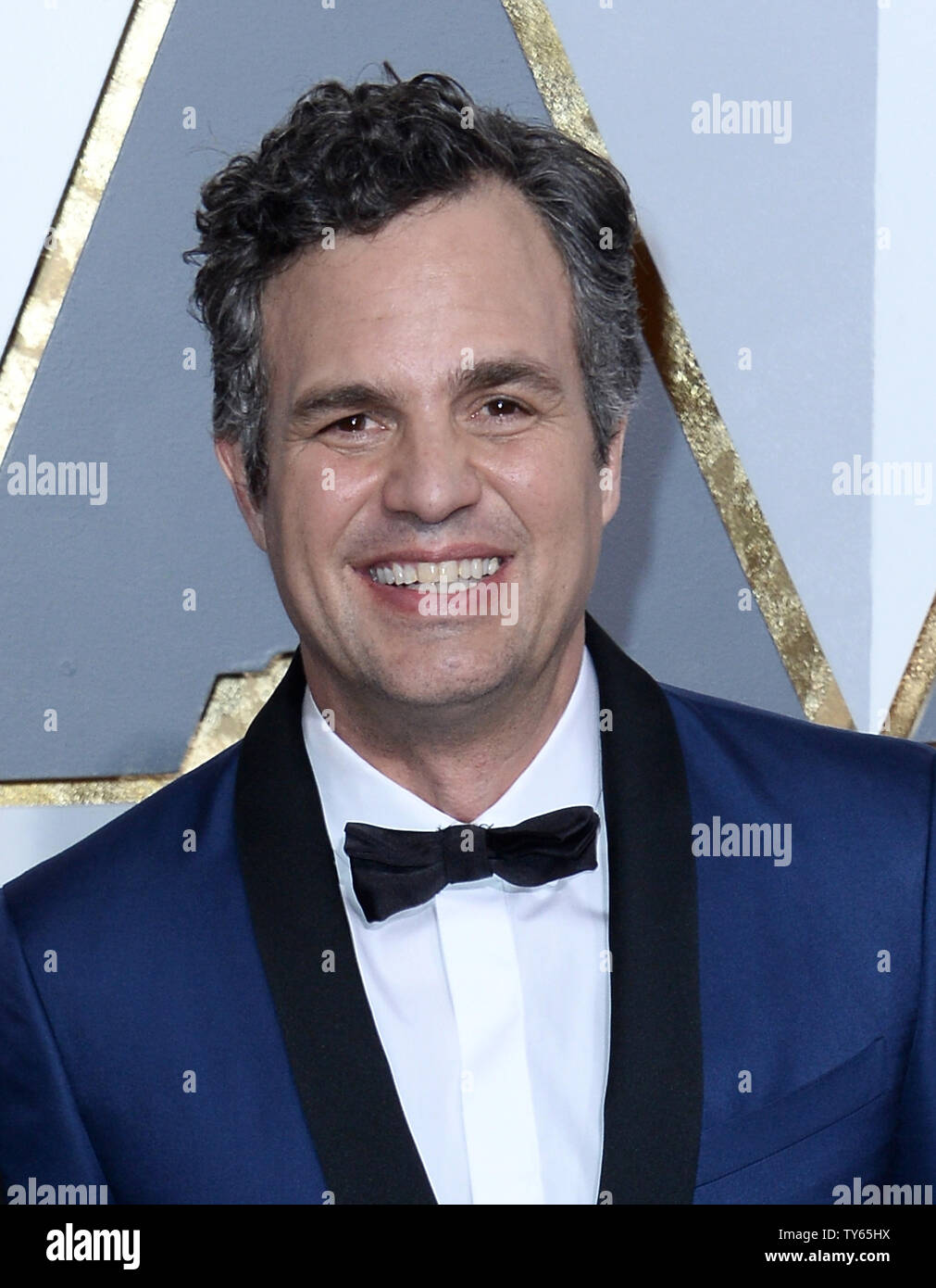 Mark Ruffalo arrives on the red carpet for the 88th Academy Awards, at ...