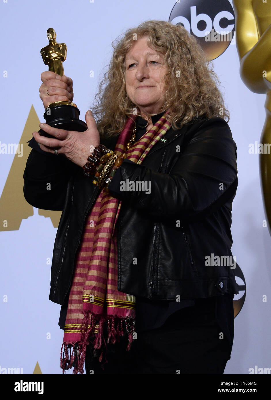 Costume designer Jenny Beavan, winner of the Best Costume Design award ...