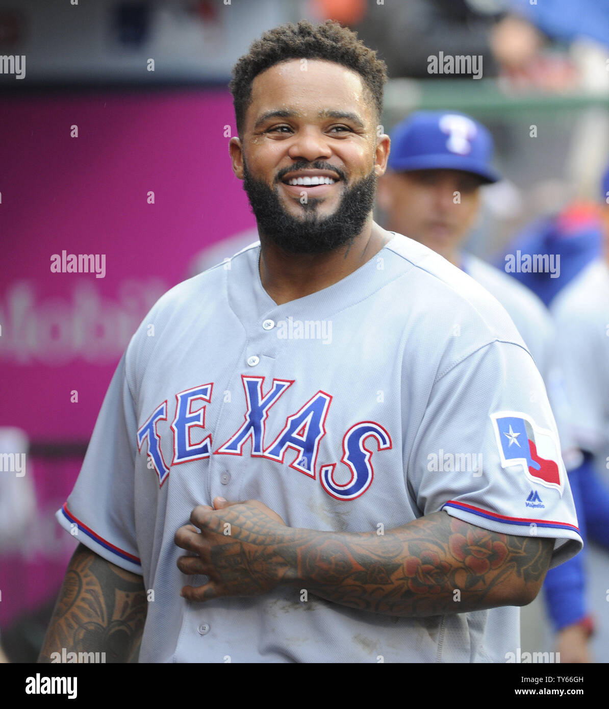 Texas Rangers' Prince Fielder is all smiles in the dugout during the ...