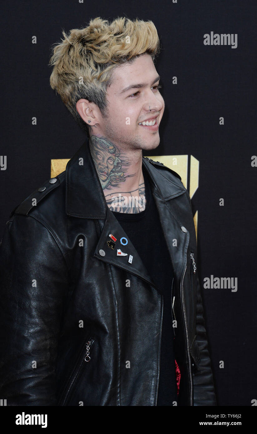 Singer T. Mills attends the MTV Movie Awards at Warner Bros. Studios in ...