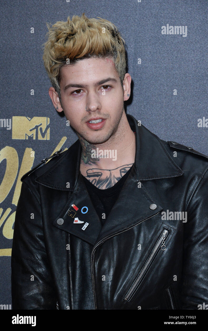 Singer T. Mills attends the MTV Movie Awards at Warner Bros. Studios in ...