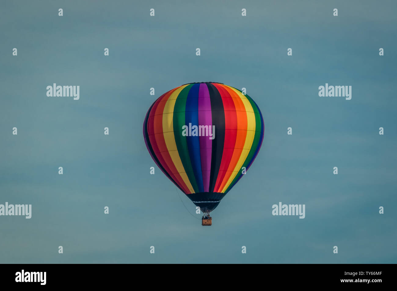 Rainbow colored hot air balloon hi-res stock photography and images - Alamy