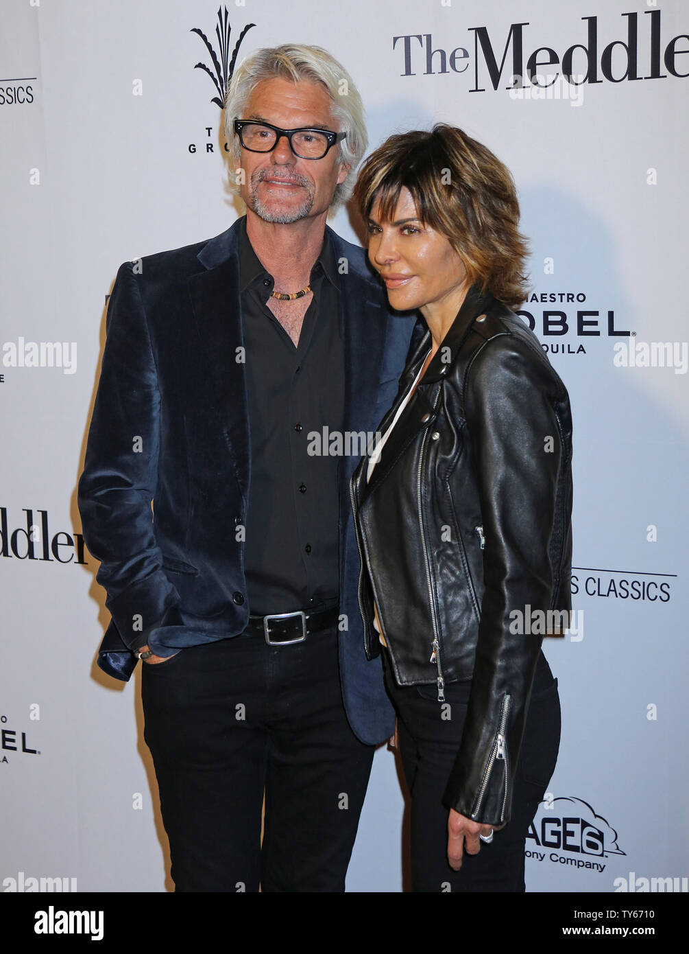 Harry Hamlin (L) and Lisa Rinna arrive at the premiere of the film "The ...