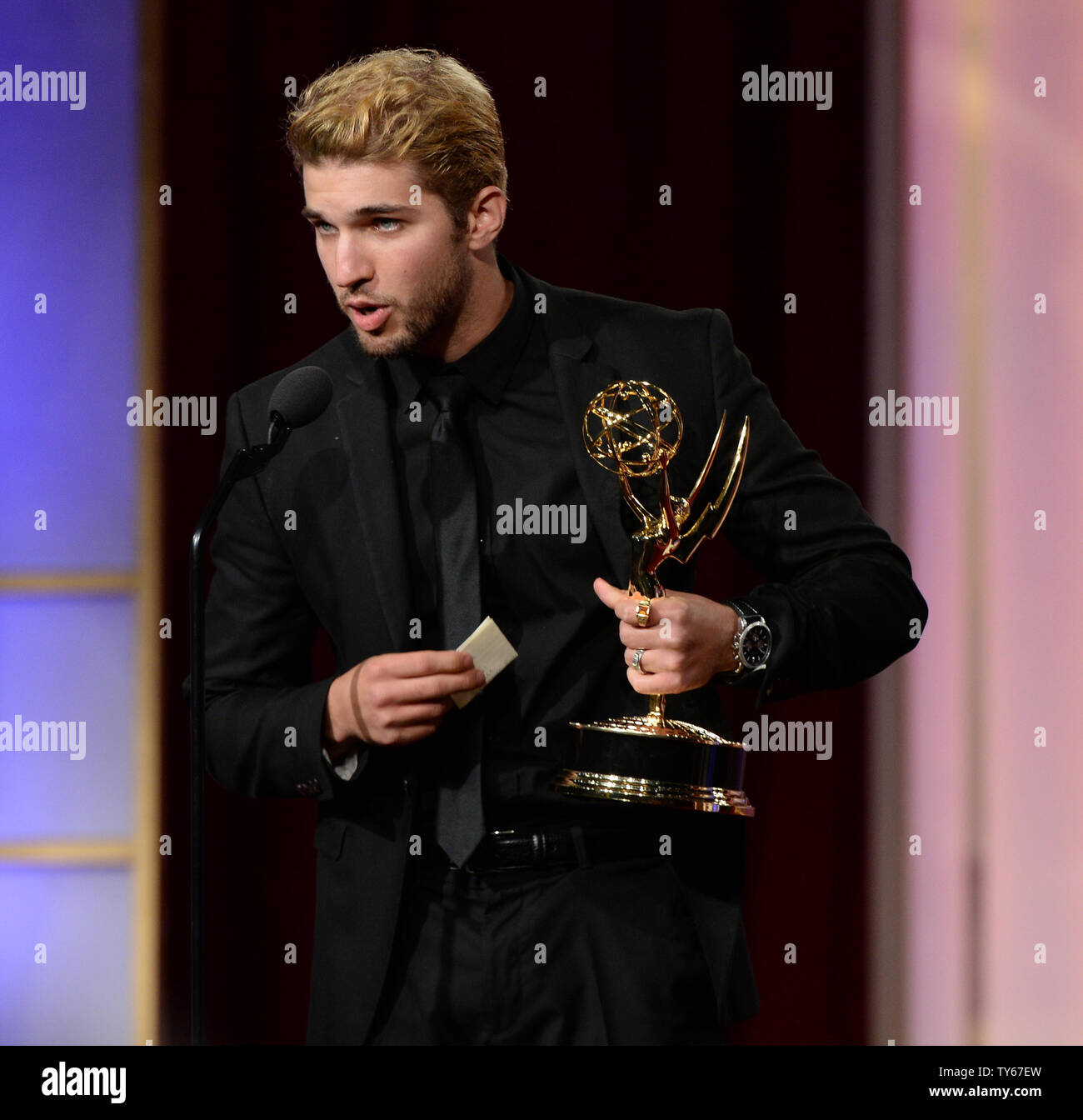 Bryan Craig accepts the Younger Actor in a Drama Series award during ...