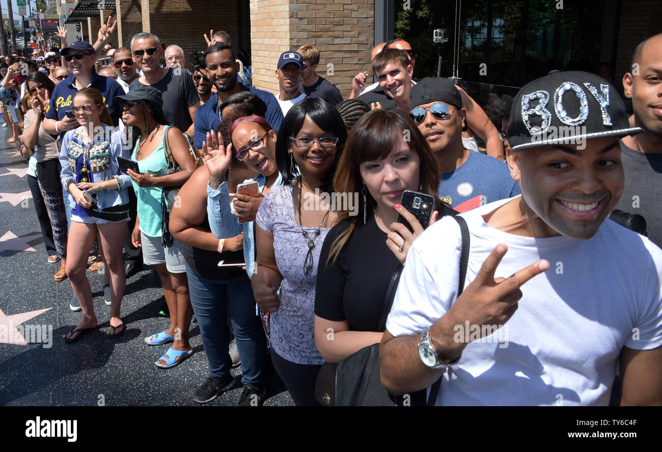 Fans line up for a glimpse of singer, songwriter and actor Usher during ...