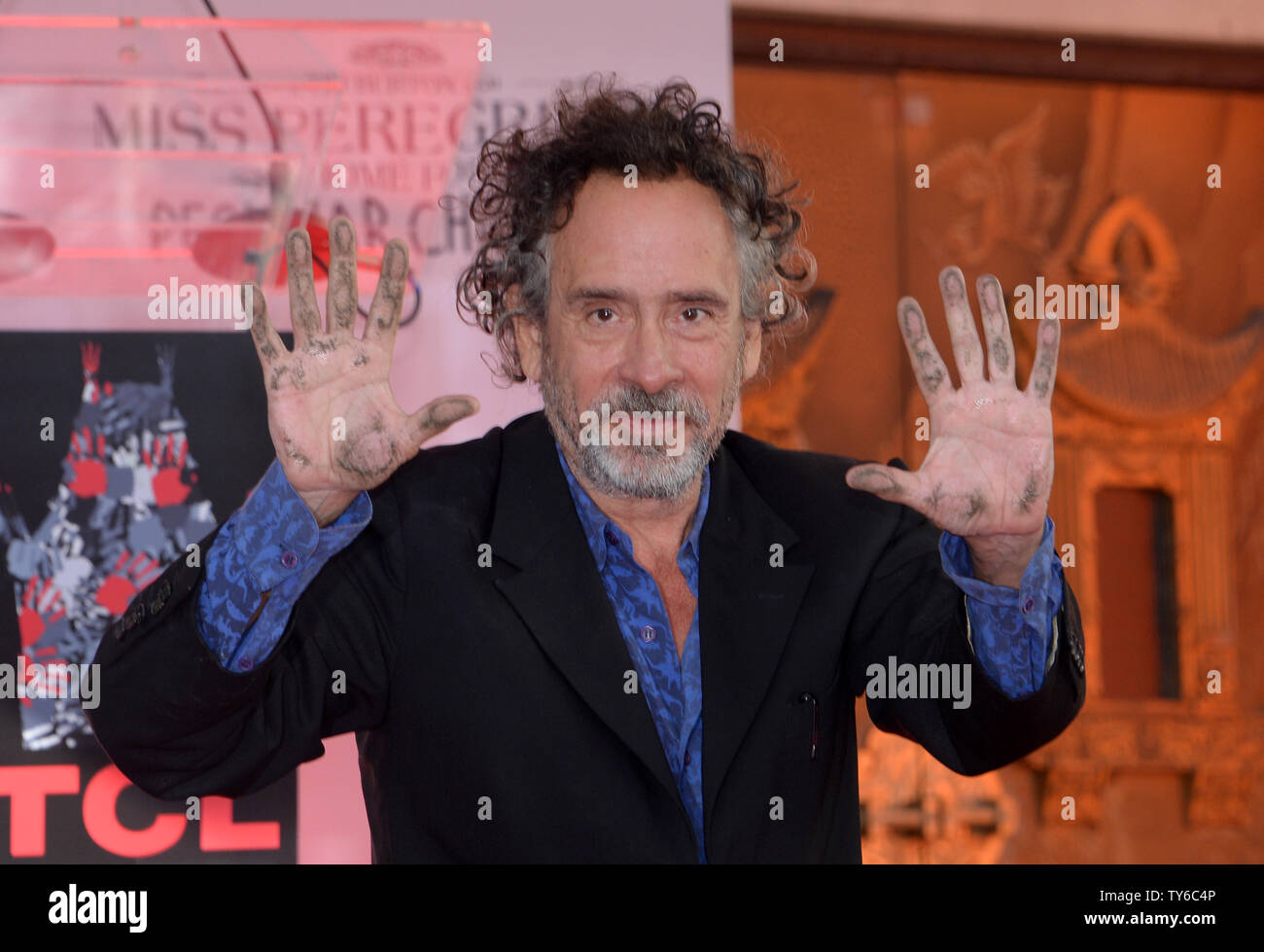 Director Tim Burton participates in a hand & footprint ceremony ...