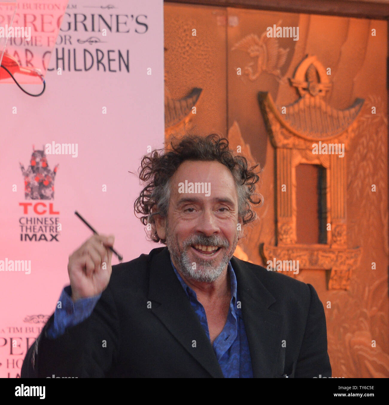 Director Tim Burton participates in a hand & footprint ceremony ...