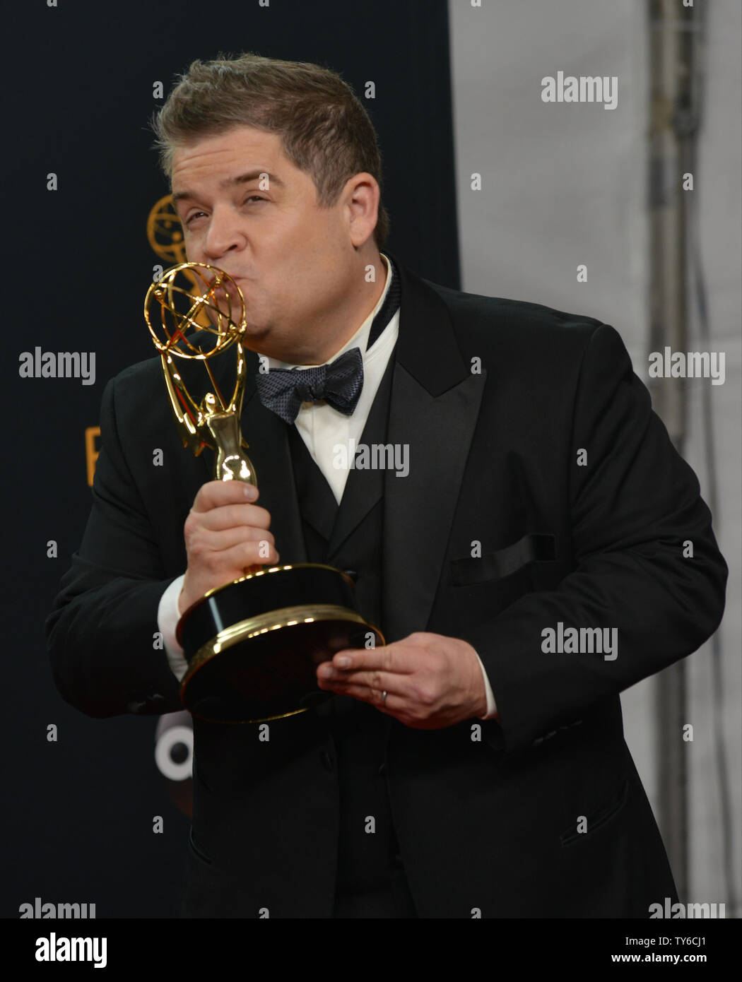 Actor/writer Patton Oswalt appears backstage with his award for ...