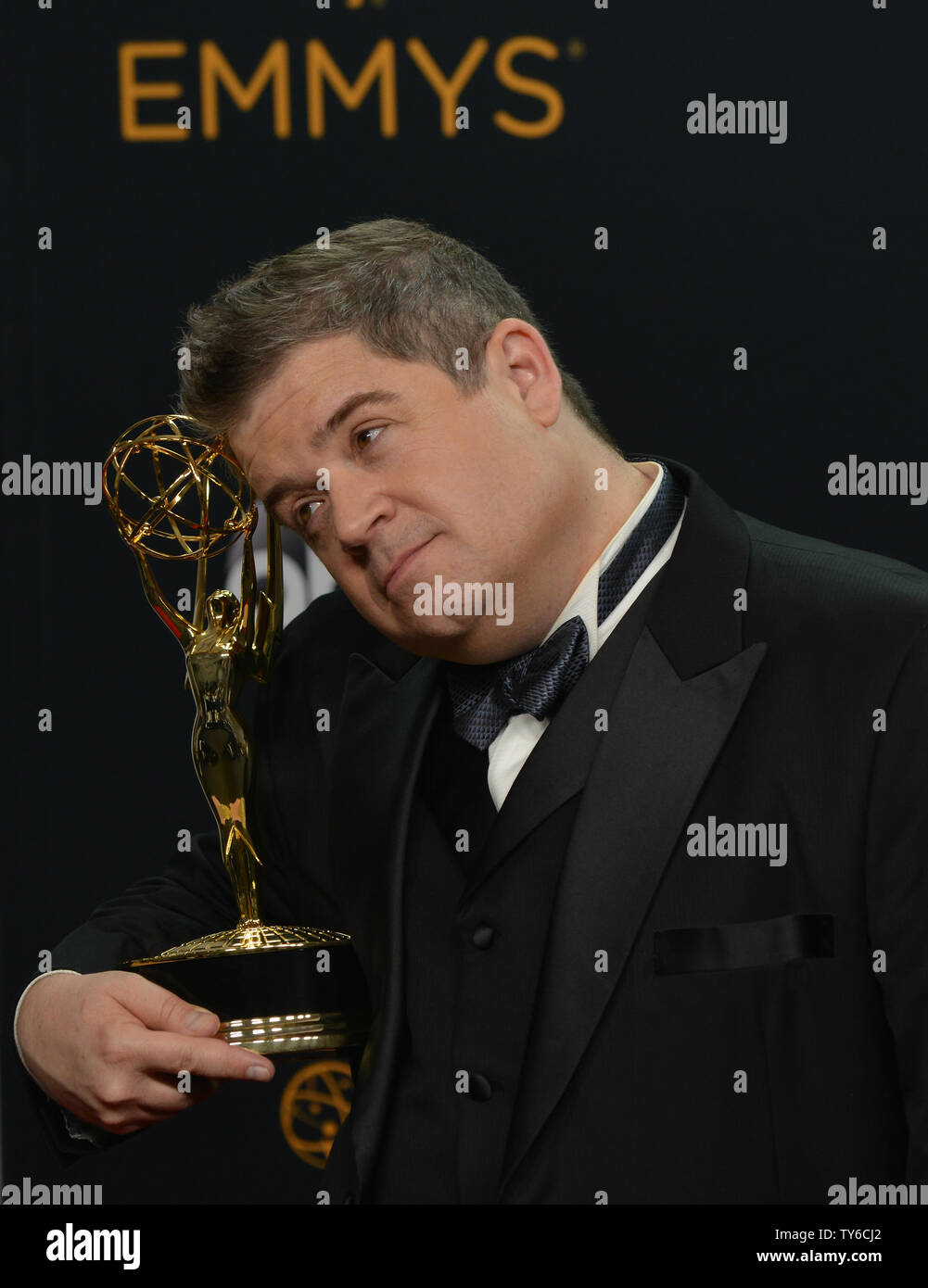 Actor/writer Patton Oswalt appears backstage with his award for ...