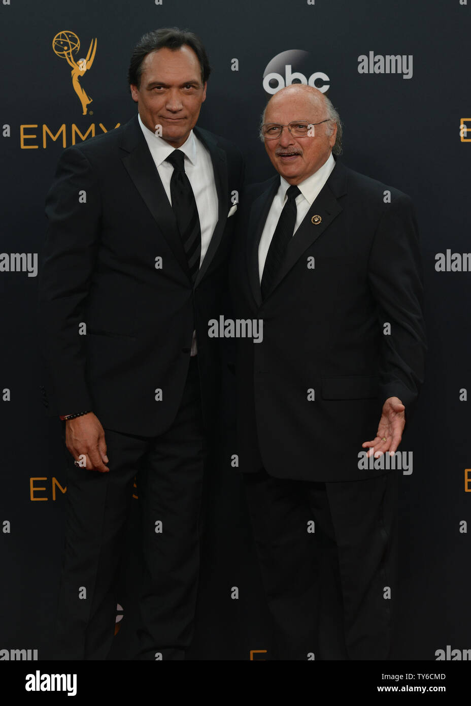 Actors Jimmy Smits (L) and Dennis Franz appear backstage during the ...