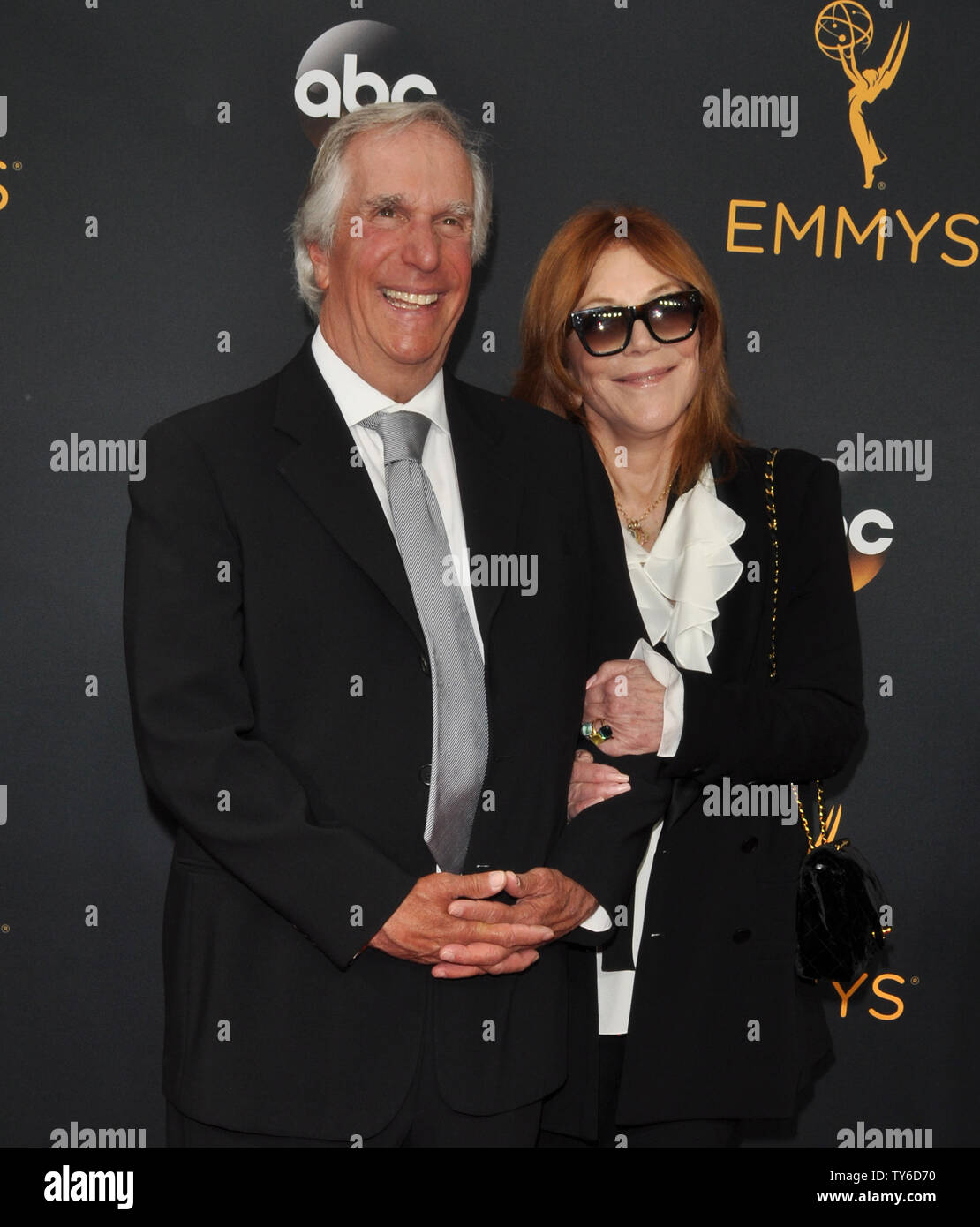 Actor Henry Winkler (L) and Stacy Weitzman arrive for the 68th annual ...