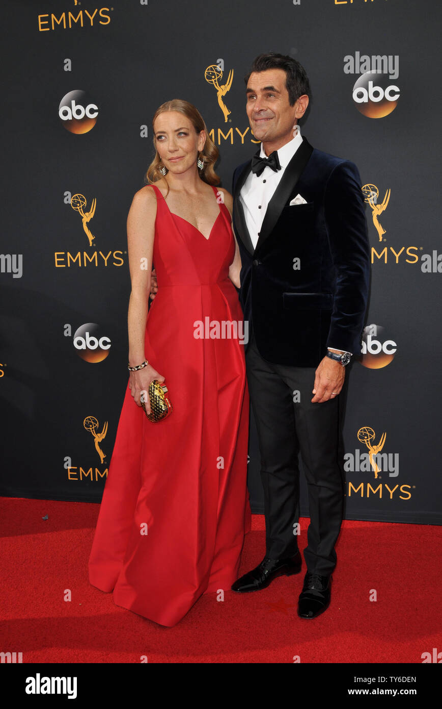 Actor Ty Burrell (R) and Holly Burrell arrive for the 68th annual ...