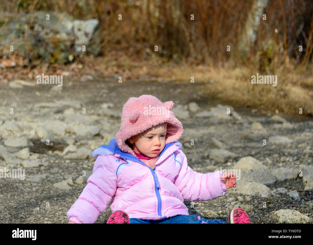 20 months old baby enjoying the nice weather outside. Toddler girl ...