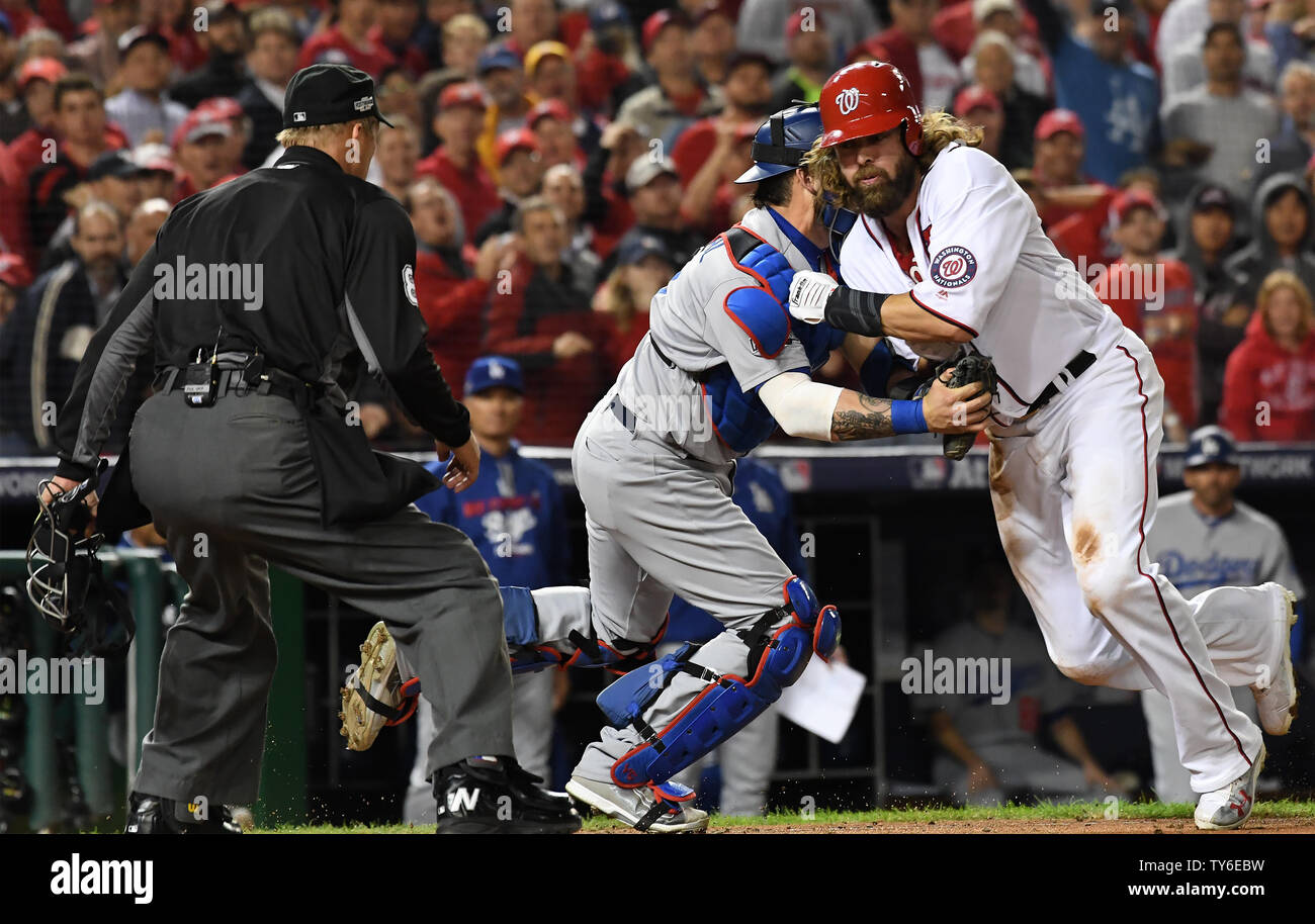 Los Angeles Dodgers catcher Yasmani Grandal tags out Washington ...