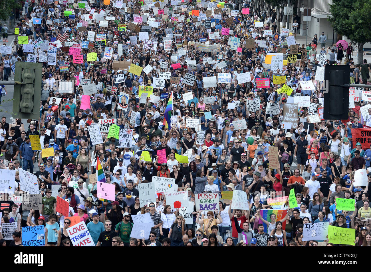 An estimated crowd of up to 10-thousand people march through downtown ...