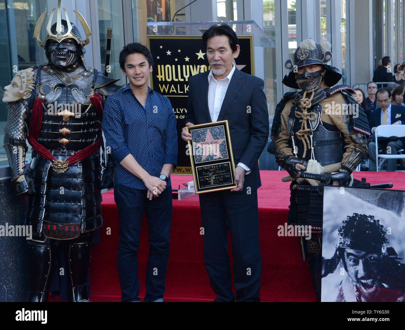 Shiro Mifune, the son of Japanese actor Toshiro Mifune holds a replica ...
