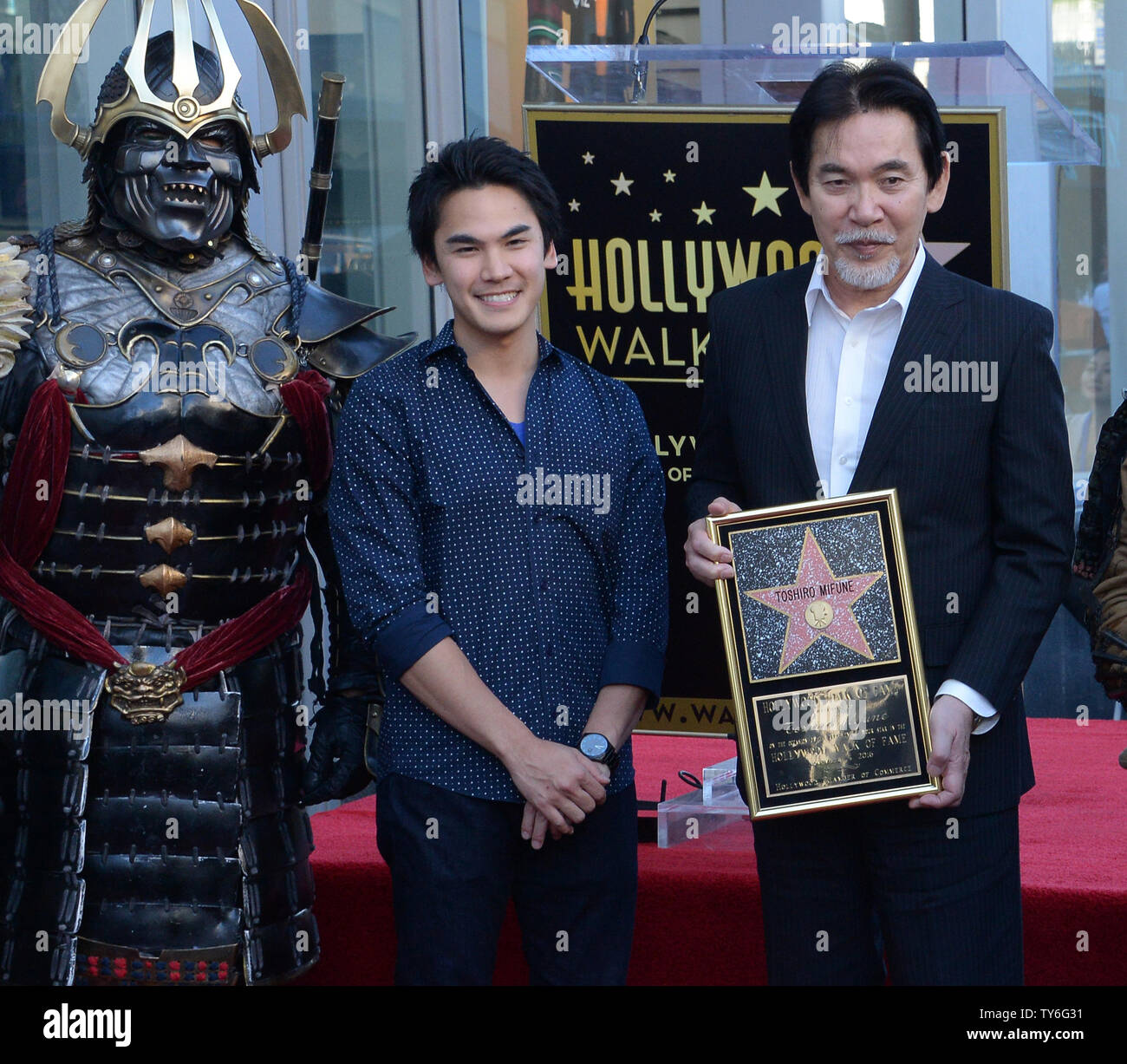 Shiro Mifune, the son of Japanese actor Toshiro Mifune holds a replica ...