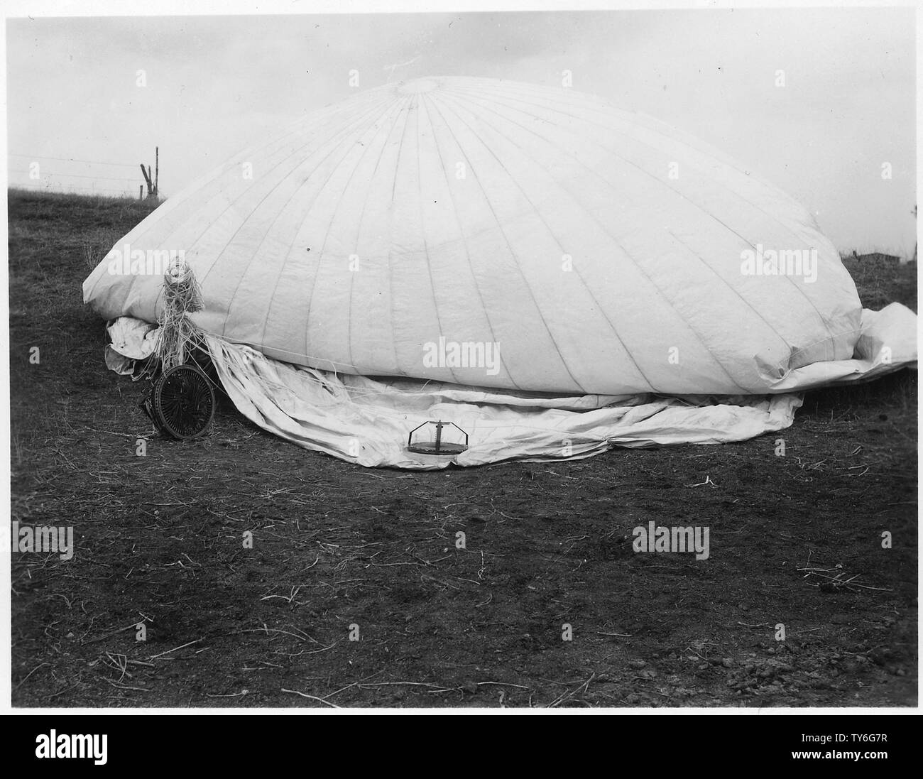 Japanese war balloon; Scope and content: Collapsed balloon on ground ...
