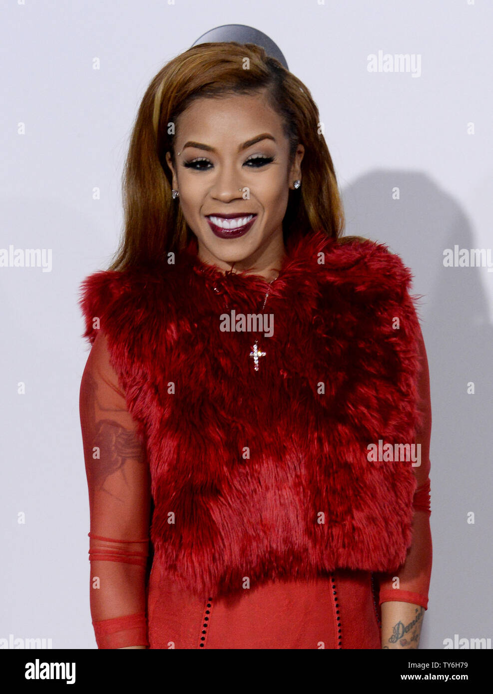 Singer Keyshia Cole arrives for the 2016 American Music Awards held at ...