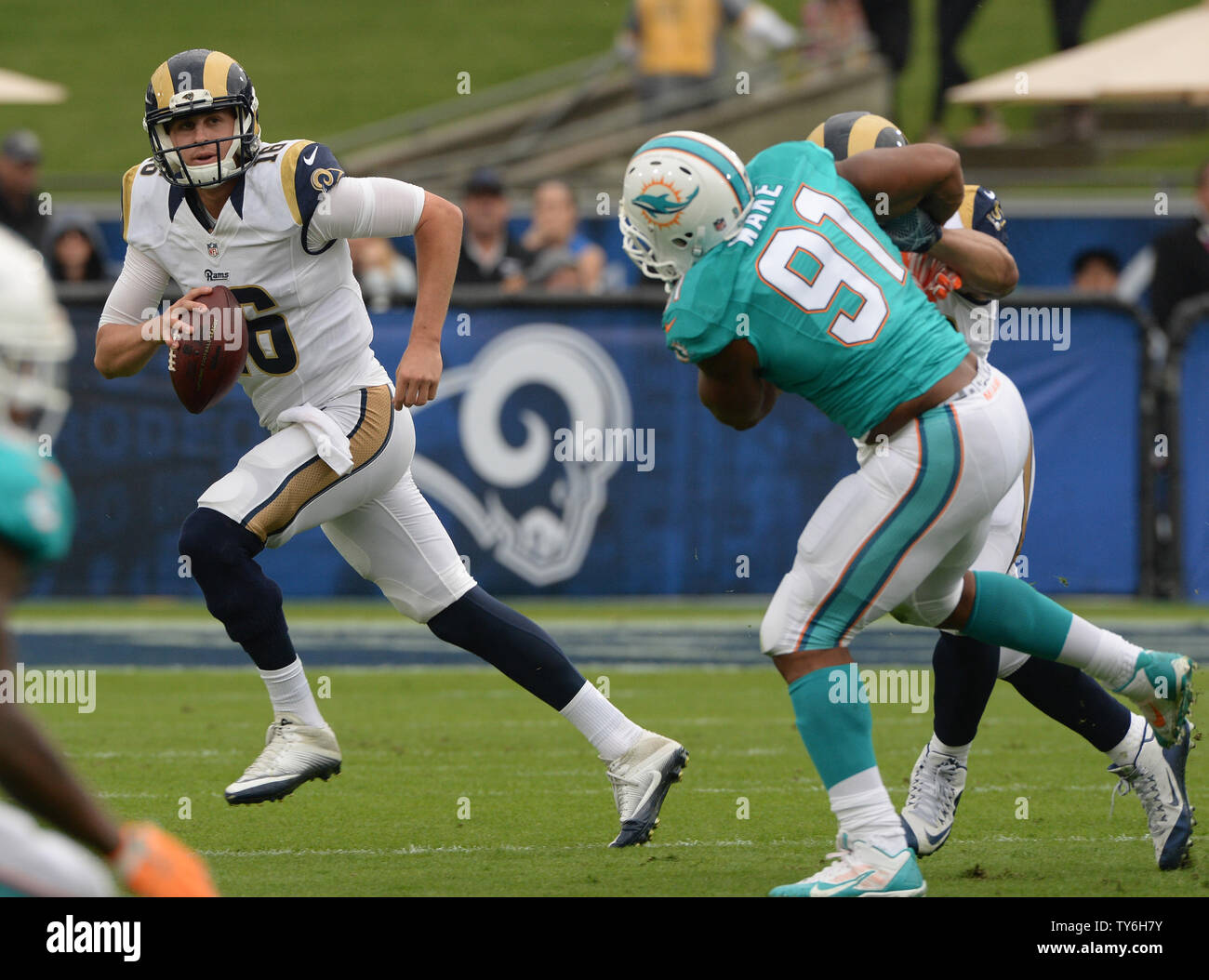 Los Angeles Rams quarterback Jared Goff (16) rolls out against Miami ...