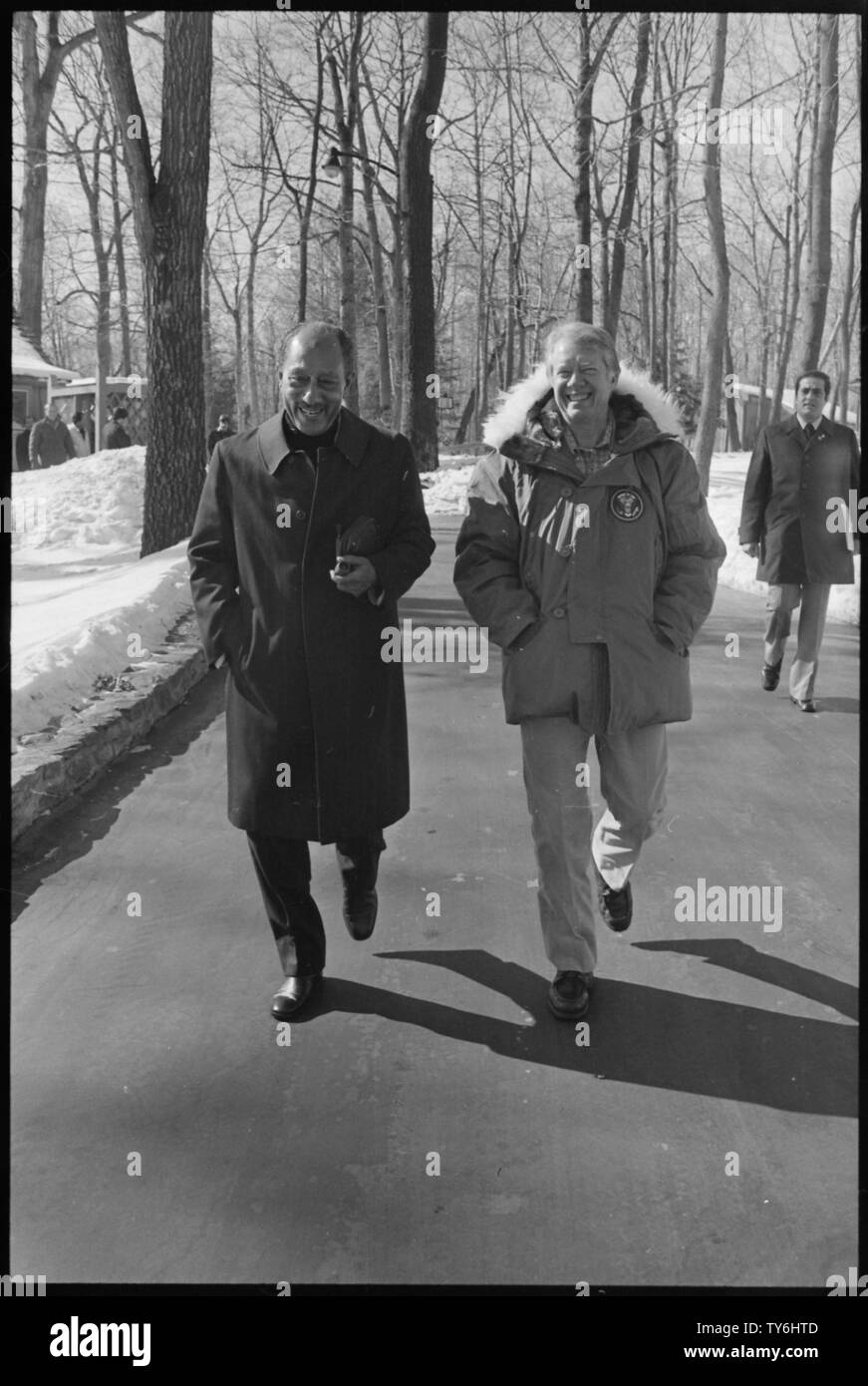 Jimmy Carter and Anwar Sadat walk along Camp David Stock Photo - Alamy