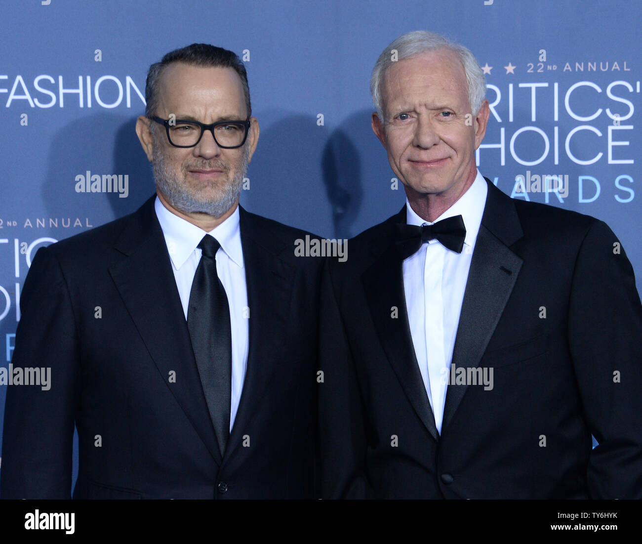 Actor Tom Hanks (L) and Chesley 'Sully' Sullenberger attend the 22nd ...