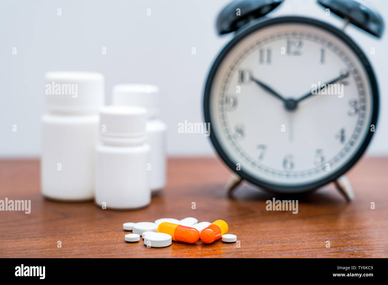 Pills, bottles and capsules — — Concept picture of taking medicine on ...