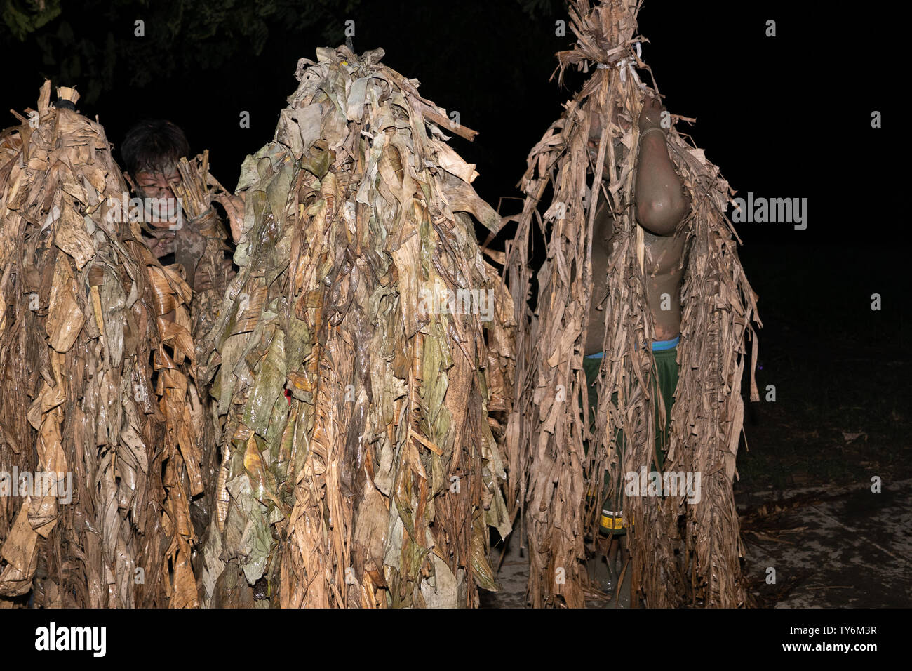 Devotees take part in the ‘Taong Putik’ or mud people festival in the ...