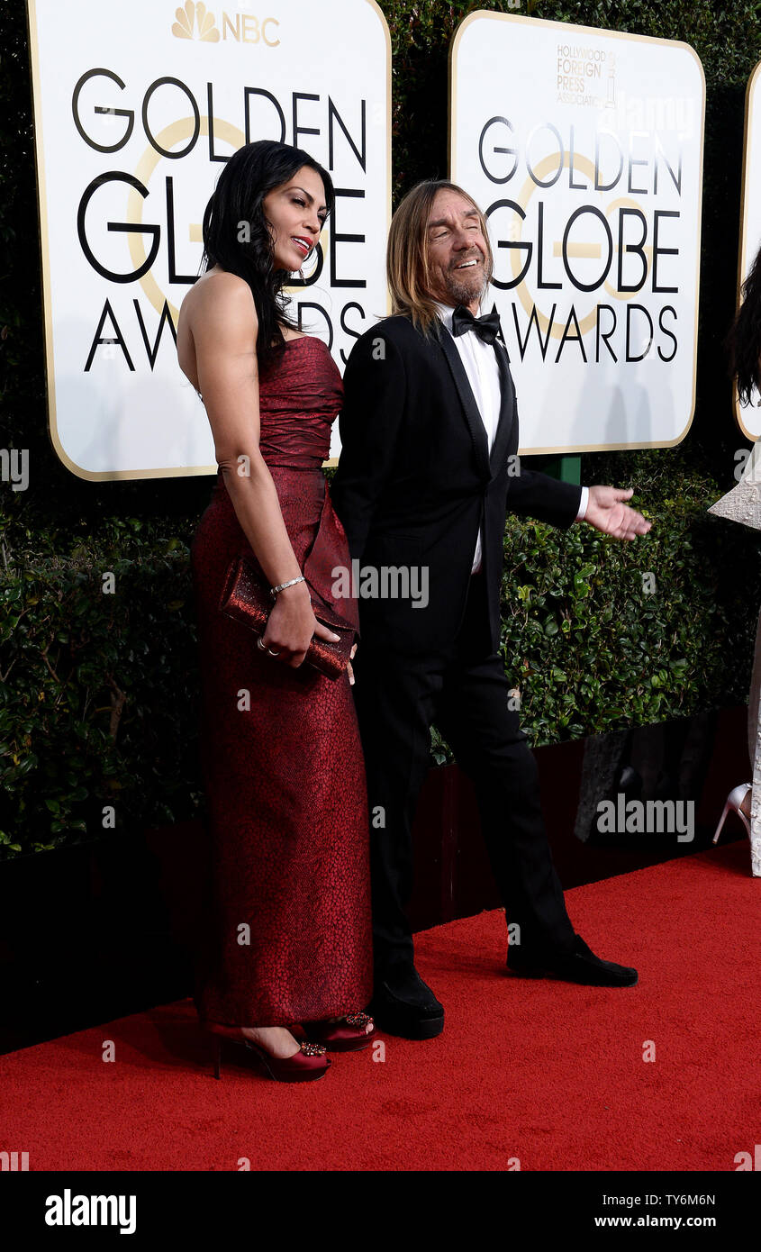 Iggy Pop (R) and Nina Alu attend the 74th annual Golden Globe Awards at ...