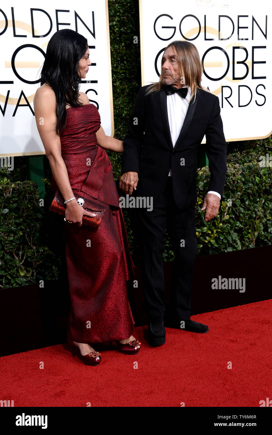 Iggy Pop (R) and Nina Alu attend the 74th annual Golden Globe Awards at ...