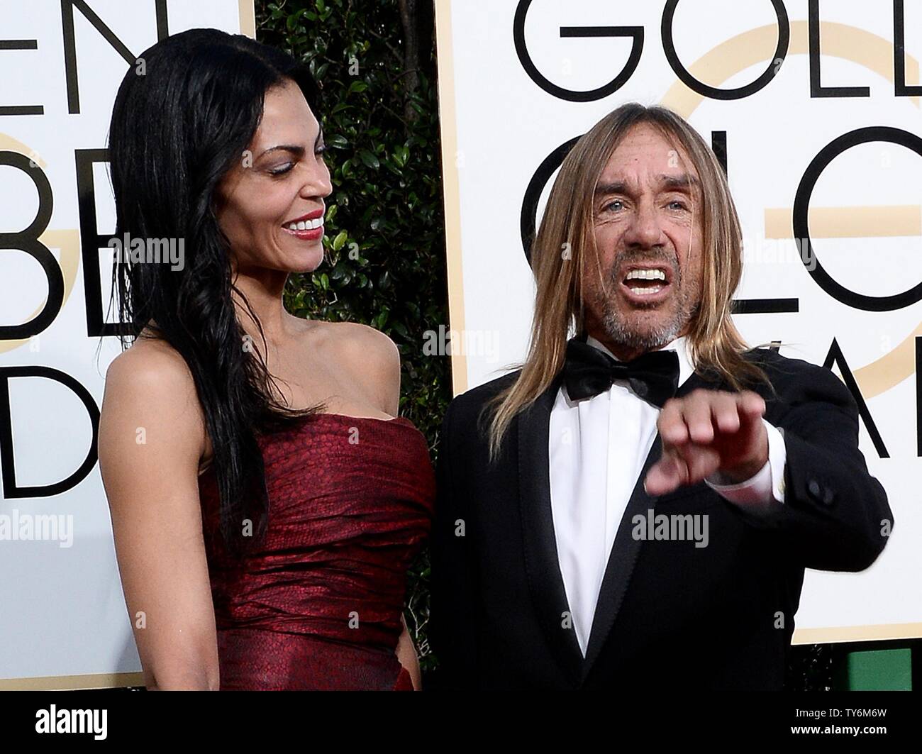 Iggy Pop (R) and Nina Alu attend the 74th annual Golden Globe Awards at ...
