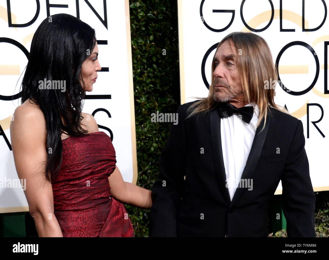 Iggy Pop (R) and Nina Alu attend the 74th annual Golden Globe Awards at ...