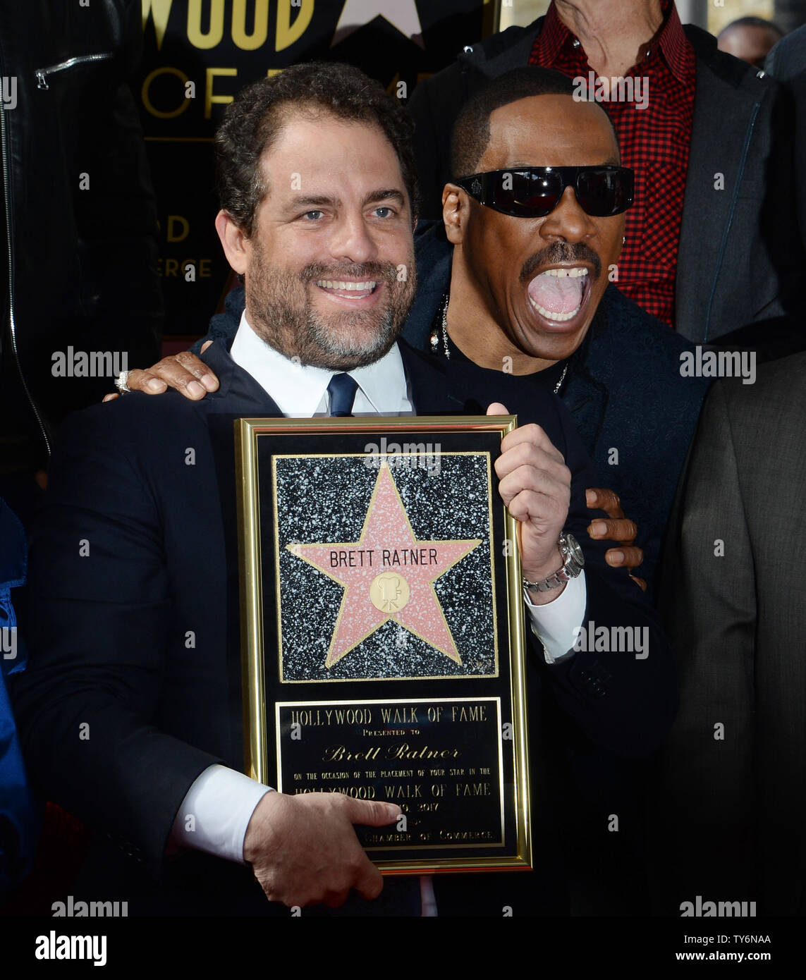 Director Brett Ratner is joined by actor Eddie Murphy during an ...