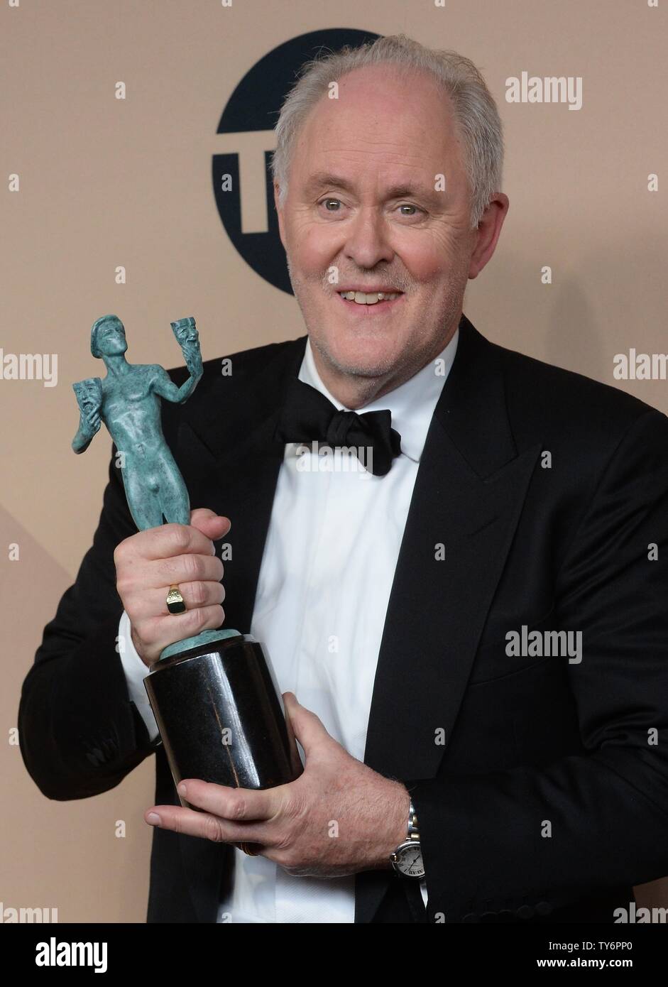 John Lithgow appears backstage with his award for Outstanding ...
