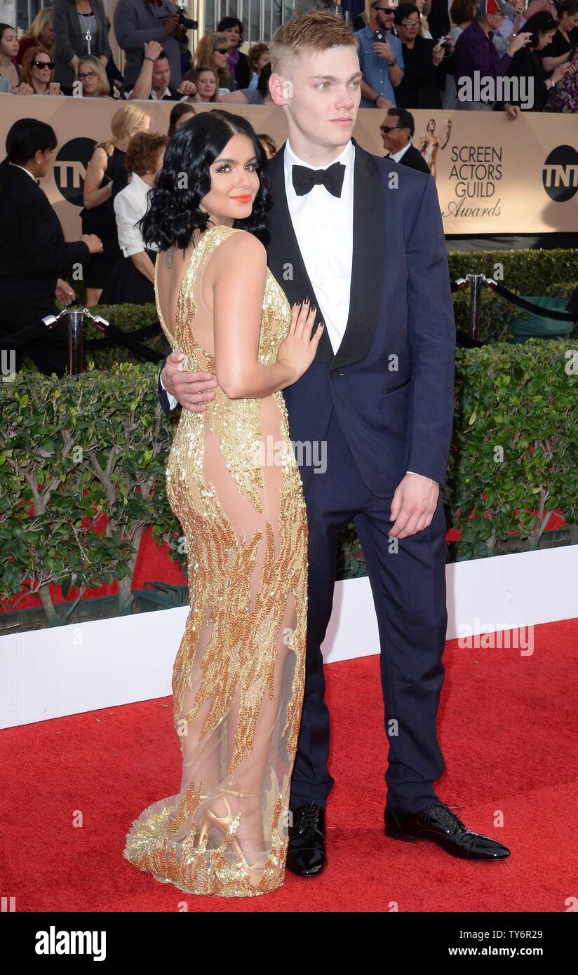 Actors Ariel Winter (L) and Levi Meaden arrive for the 23rd annual SAG Awards held at the Shrine ...