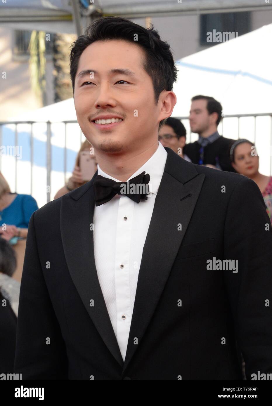 Actor Steven Yeun arrives for the 23rd annual SAG Awards held at the ...
