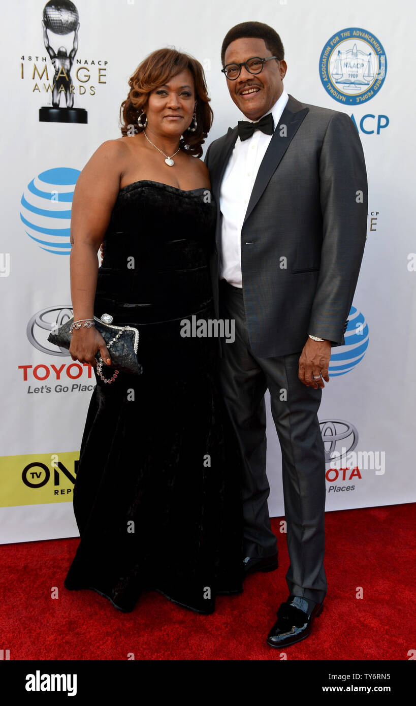 Judge Greg Mathis (R) and Linda Reese arrive for the 48th NAACP Image ...