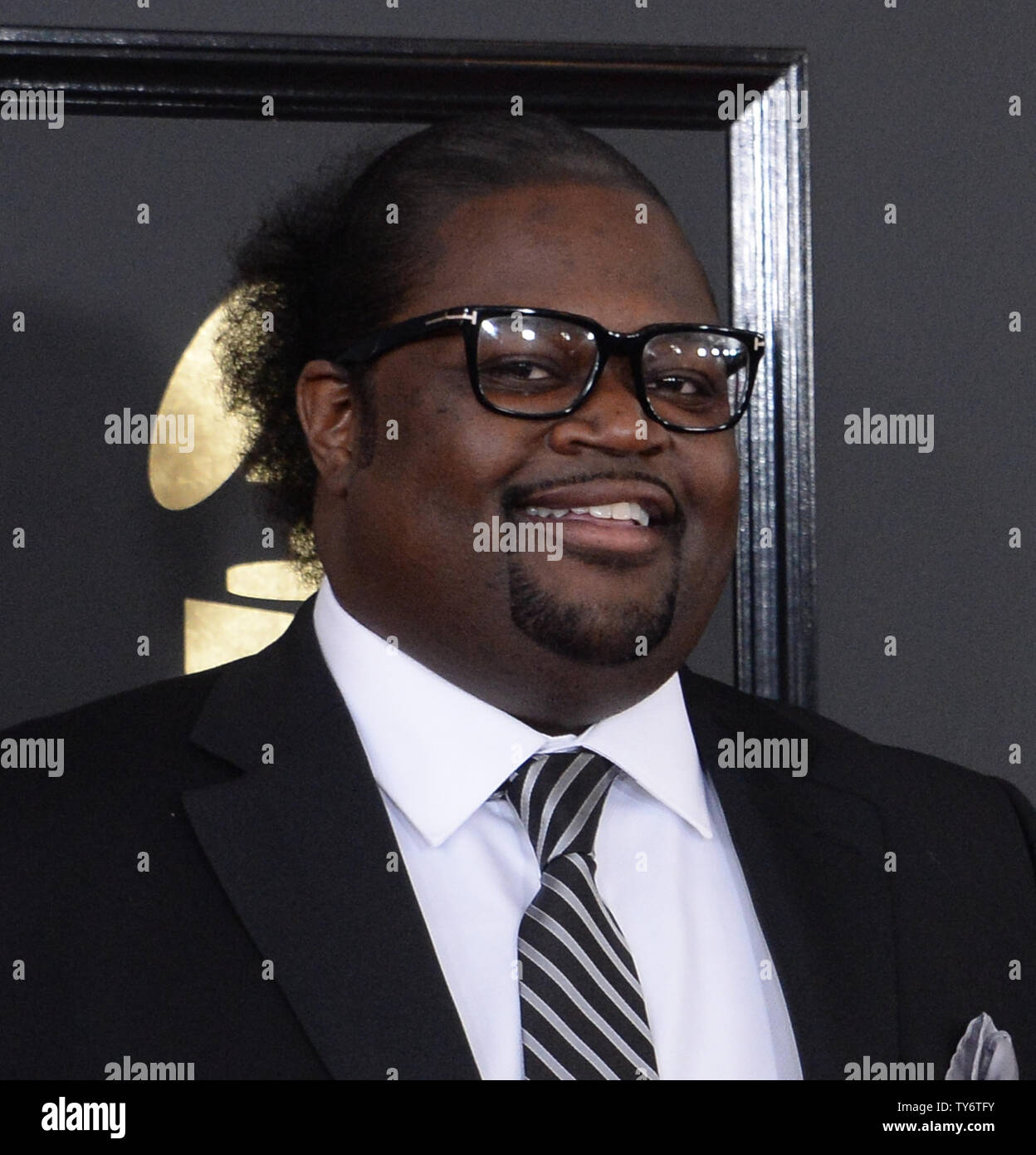 Songwriter Poo Bear arrives for the 59th annual Grammy Awards held at ...